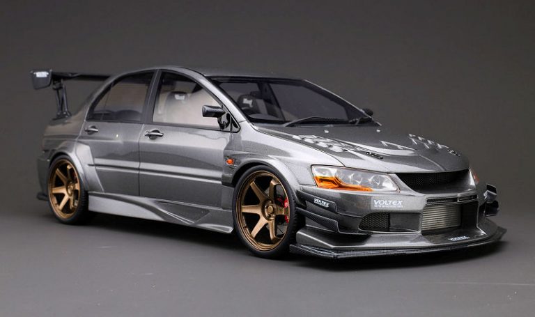 om_Mitsubishi Lancer VOLTEX EVO IX • DiecastSociety.com
